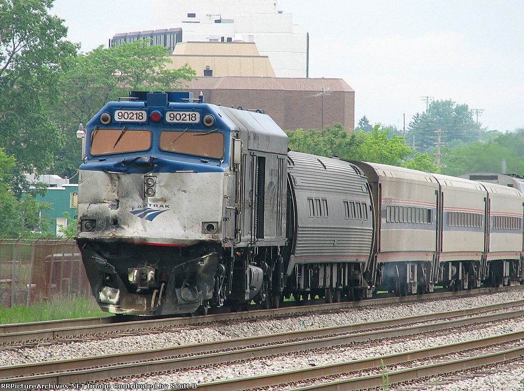 AMTK 90218 notice the lean in the loco also the brakes smoking on the first coach